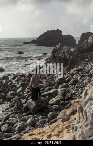 Woman standing near coast wearing swimming cap Stock Photo - Alamy