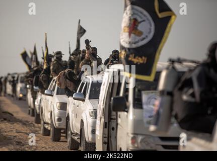 Masked Fighters of Al-Quds Brigades, the military wing of Islamic Jihad ...