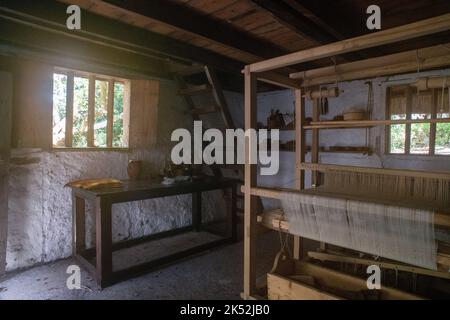 Traditional slatted windows in a recreation of a 1642 village dwelling ...