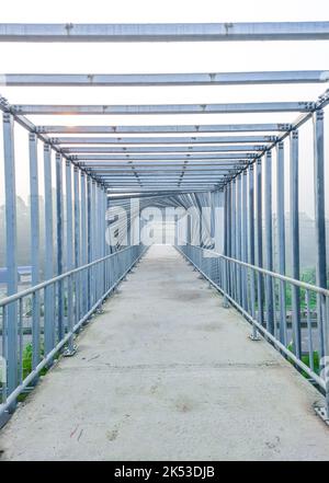 The unique interior of the bridge. Beautiful foot over bridge pathway ...