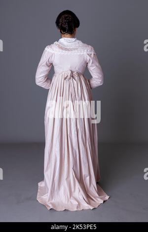 A Regency woman wearing a pink cotton gown Stock Photo - Alamy