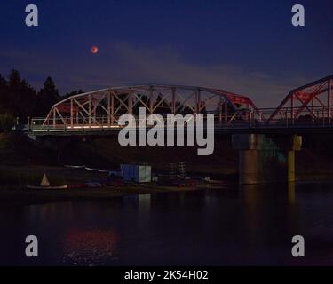 Lunar eclipse seen at the Veterans Memorial Bridge on the Russian River ...