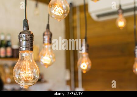 Orange lights used in the coffee shop. celebration Light bulb Stock ...