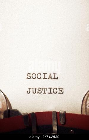 Social justice text written with a typewriter Stock Photo - Alamy