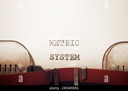 Metric system text written with a typewriter Stock Photo - Alamy