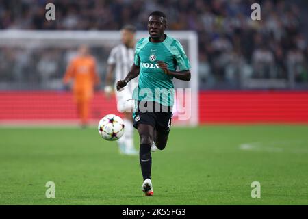 Turin, Italy . October 5, 2022, Ali Mohamed of Maccabi Haifa controls ...