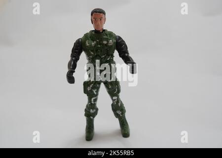 two soldier figurines arguing concept. armymen in green combat uniform ...