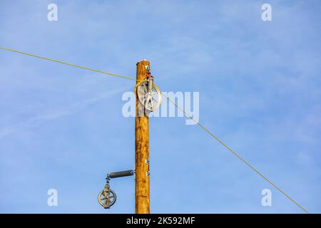 Electric utility power pole installation. Electrical grid ...