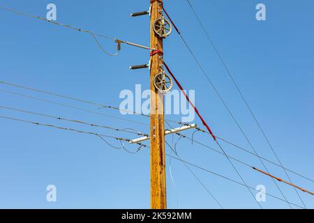 Utility power pole ready for electric line installation. Infrastructure ...