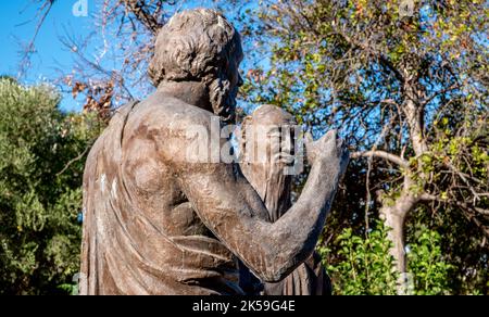 Statues of Socrates and Confucius at the ancient Agora of Athens. The ...