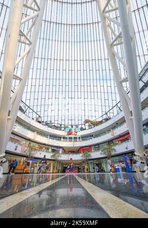Interior atrium view with steel trusses of the Norman Foster design of ...