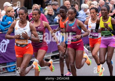 Lead group racing in the TCS London Marathon 2022 Elite Women race in ...
