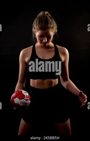 Female model with fitness outfit inside studio Stock Photo - Alamy
