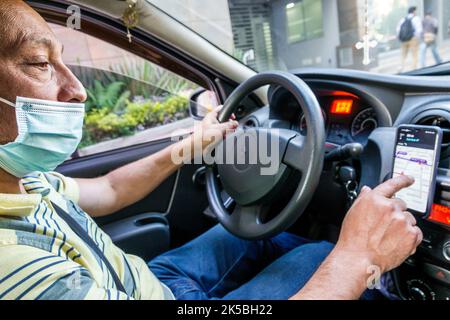 Bogota Colombia,Santa Fe Uber driver driving,man men male adult adults ...