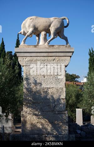 Statue of a bull at the Street of Tombs in Archaeological site of ...