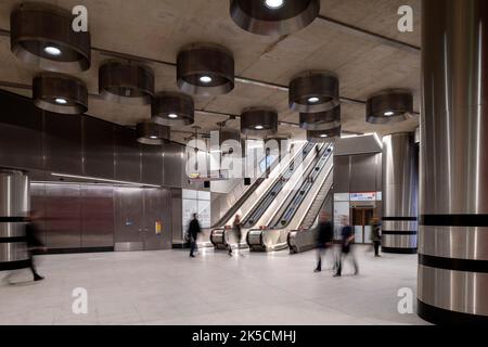 Wide view of circulation and escalator showing lighting drums. Tottenham Court Road Crossrail ...