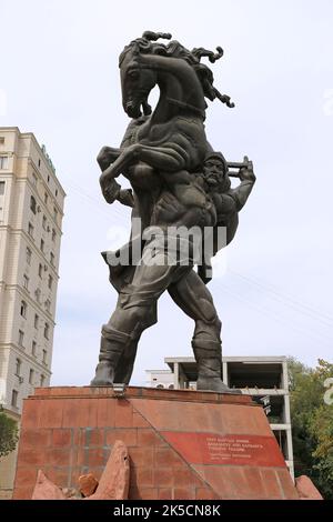 Statue of giant strongman Kojomkol (1899-1955), Togolok Moldo Street ...