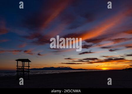 Seashore sunsets colors scenery Stock Photo - Alamy