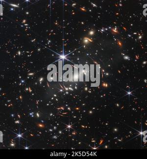 Thousands of galaxies flood this near-infrared image of galaxy cluster ...