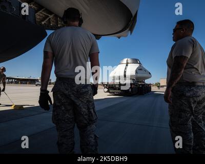The Orion team prepares the parachute test vehicle for the final drop ...
