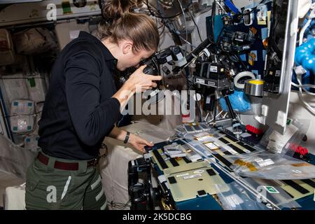 NASA astronaut Kayla Barron conducts operations for the MVP-Plant-01 ...