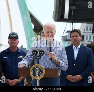 President Joe Biden greets owners Chad and Heather Balliet and ...
