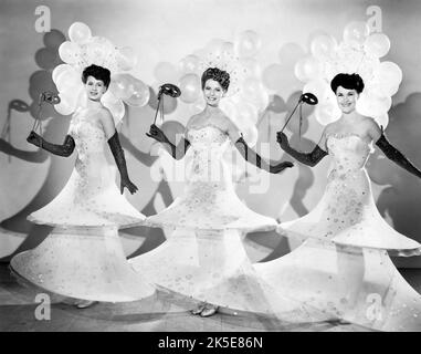 Three Chorines / Chorus Girls on set candid portrait during filming of ...
