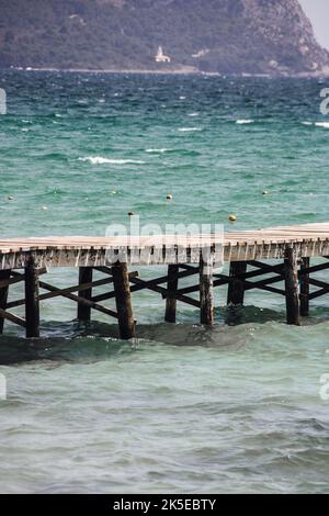 A wooden platform over the beach during summer Stock Photo - Alamy