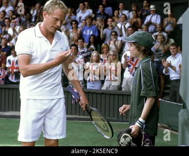 Peter Colt (PAUL BETTANY) and a ball boy (JONATHAN TIMMINS) wish each ...