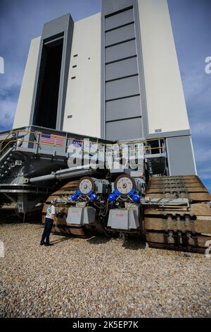 The crawler-transporter, driven by engineers, approaches the Vehicle ...