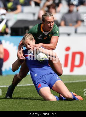 South Africa's Libbie Janse van Rensburg is tackled by Fiji's Lavena ...