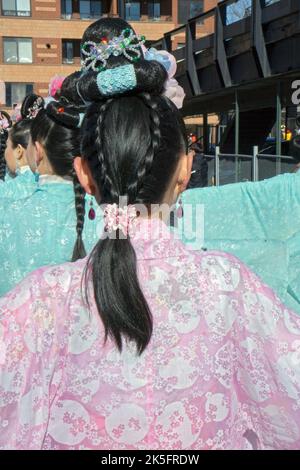 Falun Dafa (Falun Gong) marchers in the Montpelier, VT, USA, July 4 ...