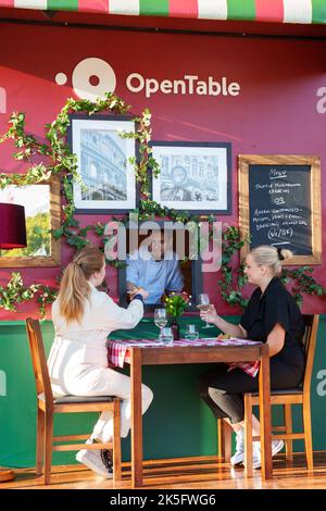 EDITORIAL USE ONLY Diners at OpenTable's pop-up. The pop-up launches as ...