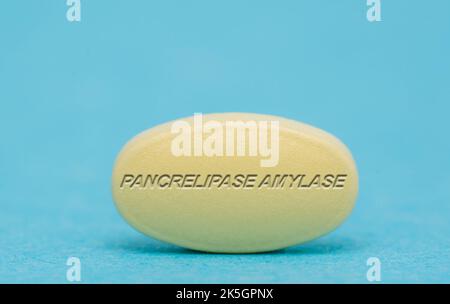 Pancrelipase lipase pill, conceptual image Stock Photo - Alamy