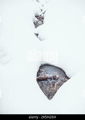 Minimalist abstract picture of a mountain stream flowing beneath the ...