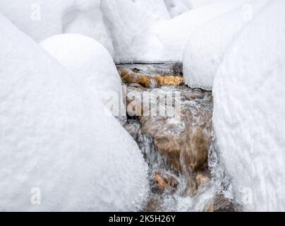 Minimalist abstract picture of a mountain stream flowing beneath the ...