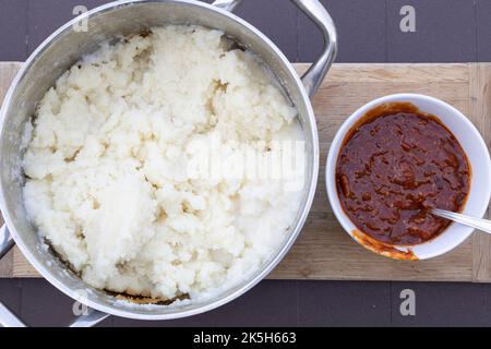 Traditional South African Maize meal in rustic green pot Stock Photo ...