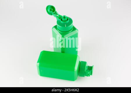 made of green plastic medical jars with lids Stock Photo - Alamy