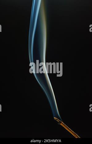 Trajectory of incense smoke in the air showing different shapes. France ...