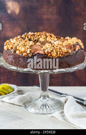 Moist chocolate, pear and golden hazelnut torte Stock Photo - Alamy
