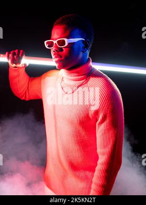 cyberpunk, man and red neon light studio for futuristic eyewear fashion ...