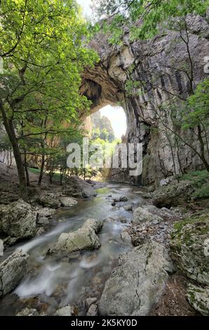 natural rock arch on the Vratna River in Serbia Stock Photo - Alamy