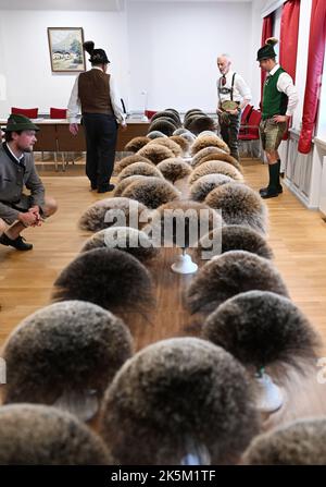 Mittenwald, Germany. 09th Oct, 2022. Jury members examine the submitted ...