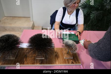 Mittenwald, Germany. 09th Oct, 2022. Jury members examine the submitted ...