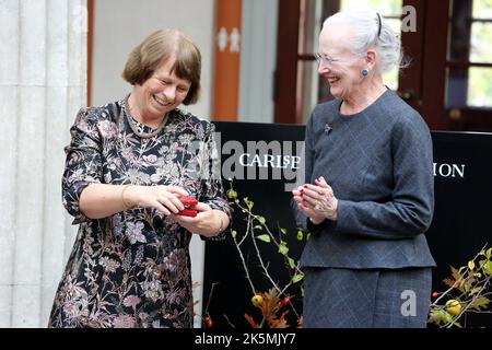 Professor Ewine van Dishoeck and Queen Margrethe. H.M. The Queen ...