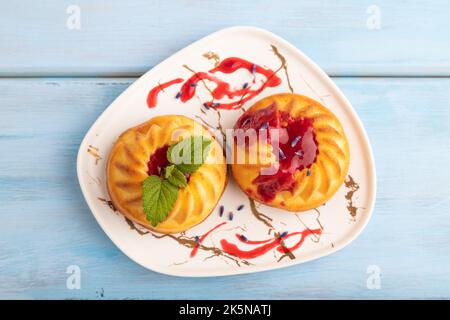 Semolina cheesecake with strawberry jam, lavender, cup of coffee on ...