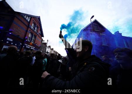 Everton fans with flares outside the ground ahead of the Premier League ...