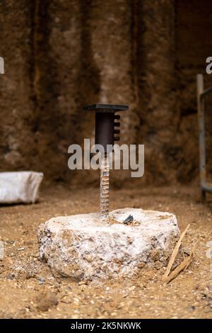 Construction site basement excavation with temporary propping, concrete ...