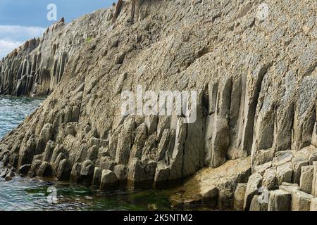 natural landscape with a sheer cliff folded columnar basalt on the ...