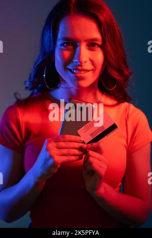 E-banking, money transferring online. Cheerful African-American man ...